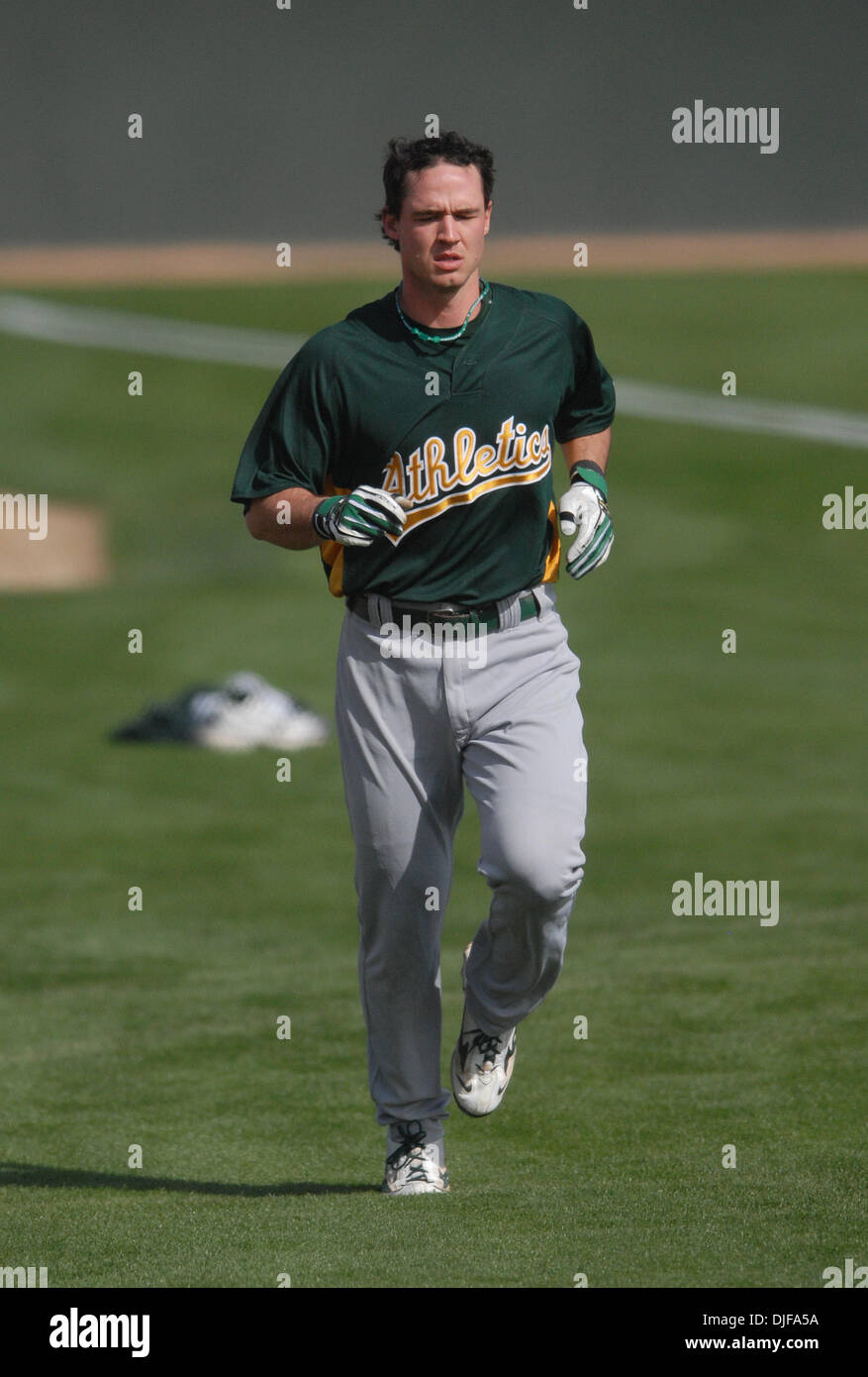 A's infielder Jack Hannahan warms up during spring training at Papago ...