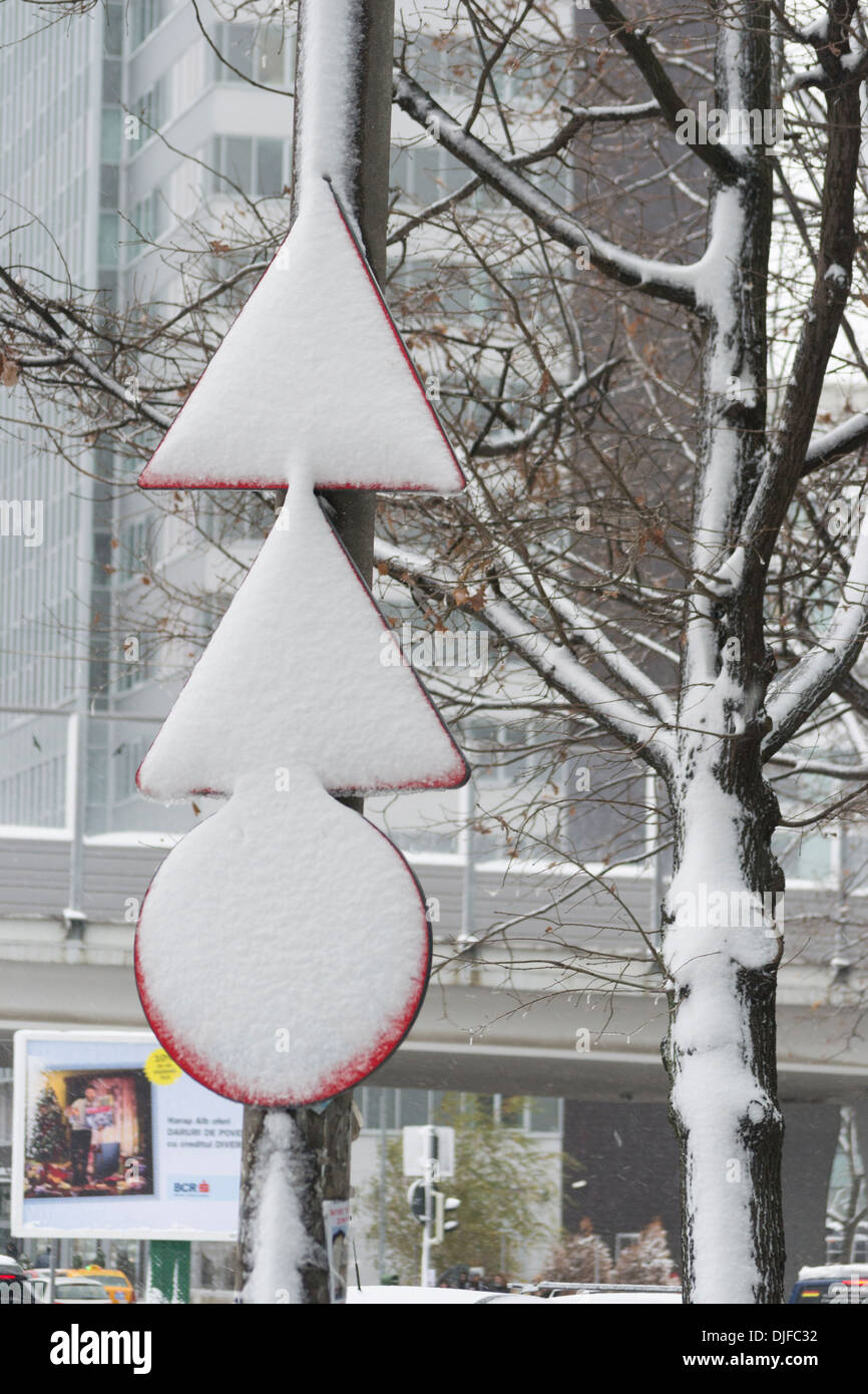 Snow covered road signs Stock Photo - Alamy