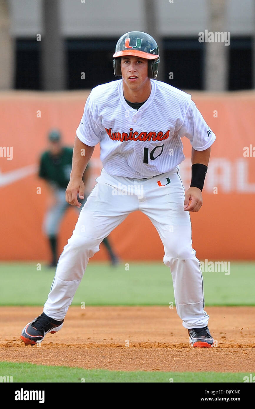 Miami Hurricanes OF Nathan Melendres (10) takes lead off first base ...
