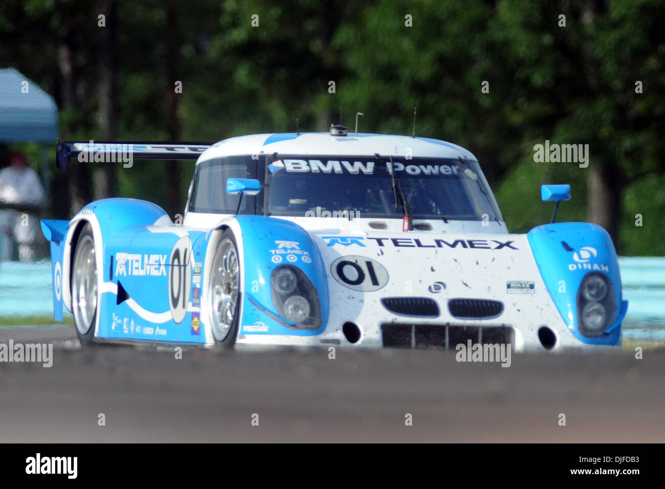 Driver Scott Pruett pilots the #01 BMW Riley through the inner loop ...