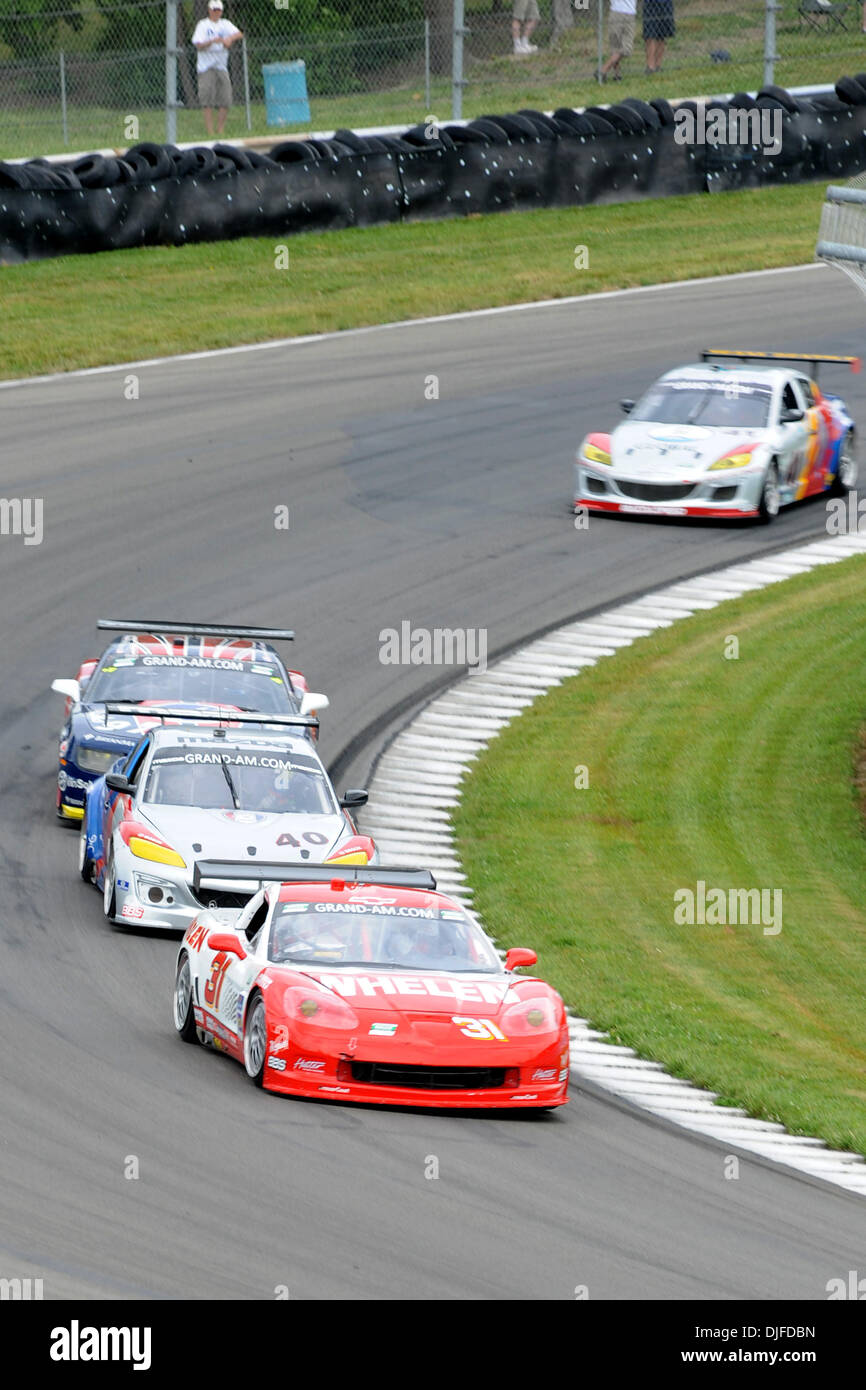 The Whelen Corvette (31) driven by Sonny Whelen and Eric Curran leads a ...