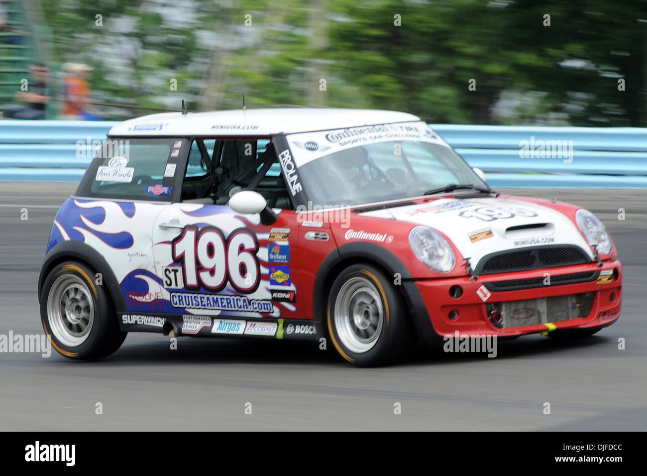 The #196 Mini Cooper S driven by Owen Trinkler and Randall Smalley ...