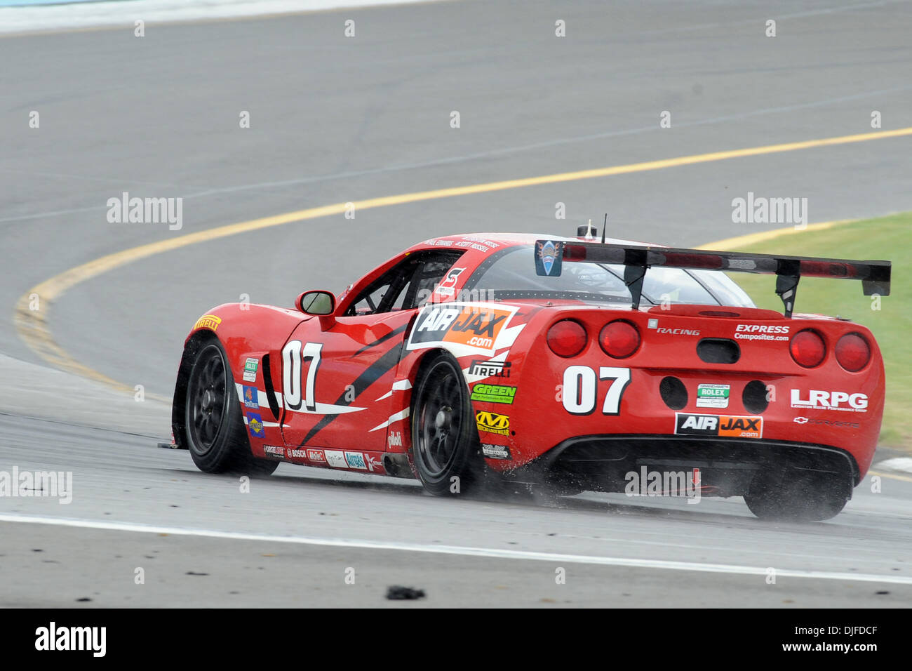 Water mists off the back of the Corvette from Banner Racing driven by ...