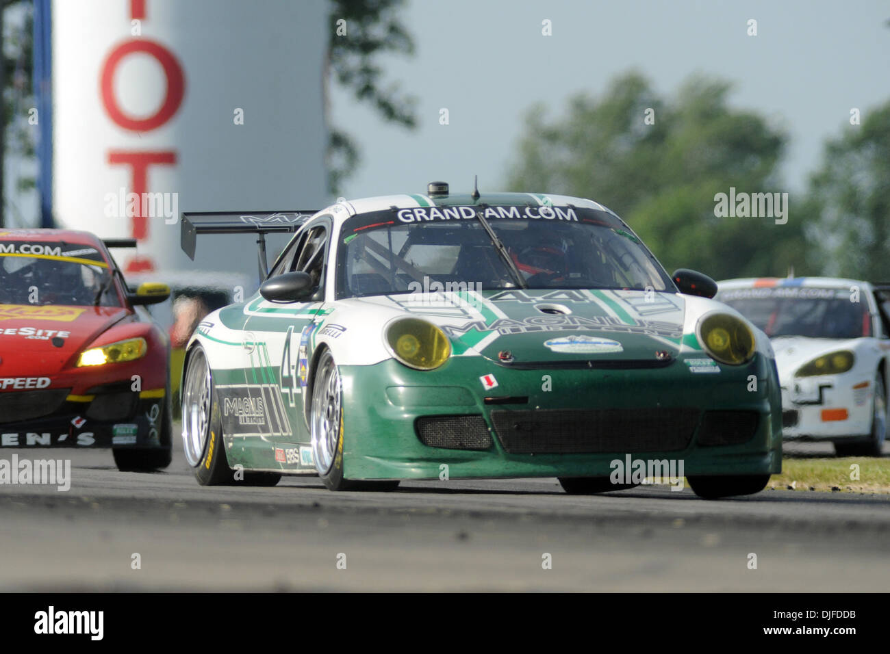 The Magnus Racing Porsche GT3 (44) driven by John Potter and Craig ...