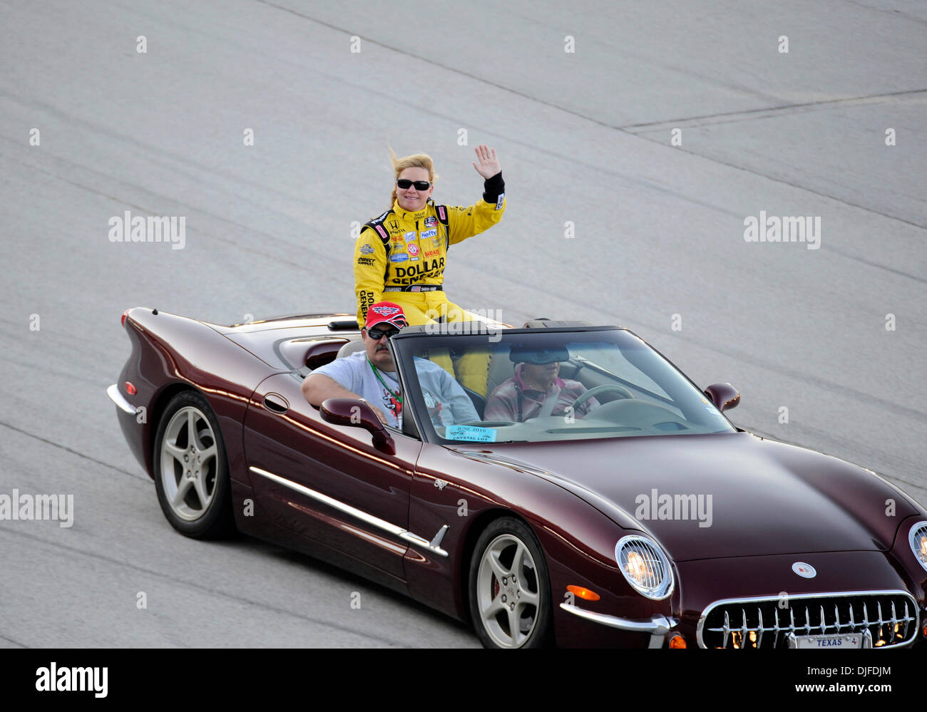 Sarah Fisher of Sarah Fisher Racing waves to the crowd before the IZOD ...