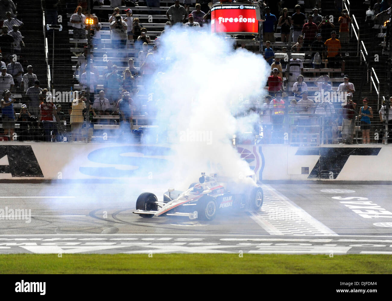 Ryan Briscoe of Team Penske celebrates his win with a spinout at the ...