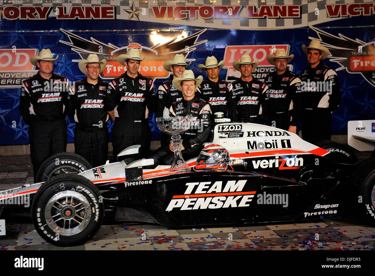 Australian driver Ryan Briscoe (6) and Team Penske celebrate winning ...