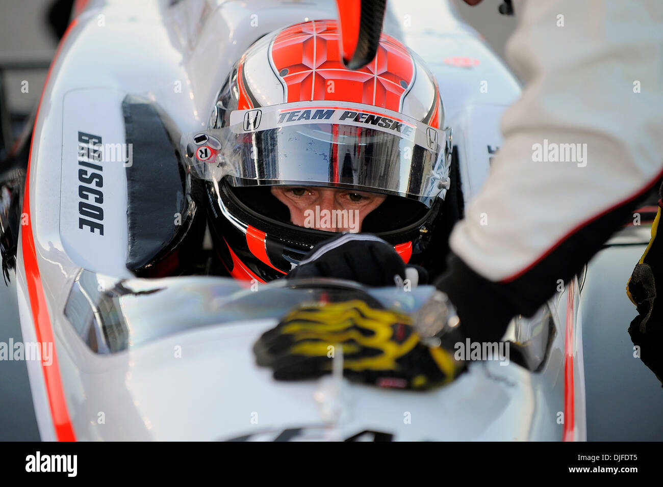 Ryan Briscoe (6) performs some last minute adjustments before his ...