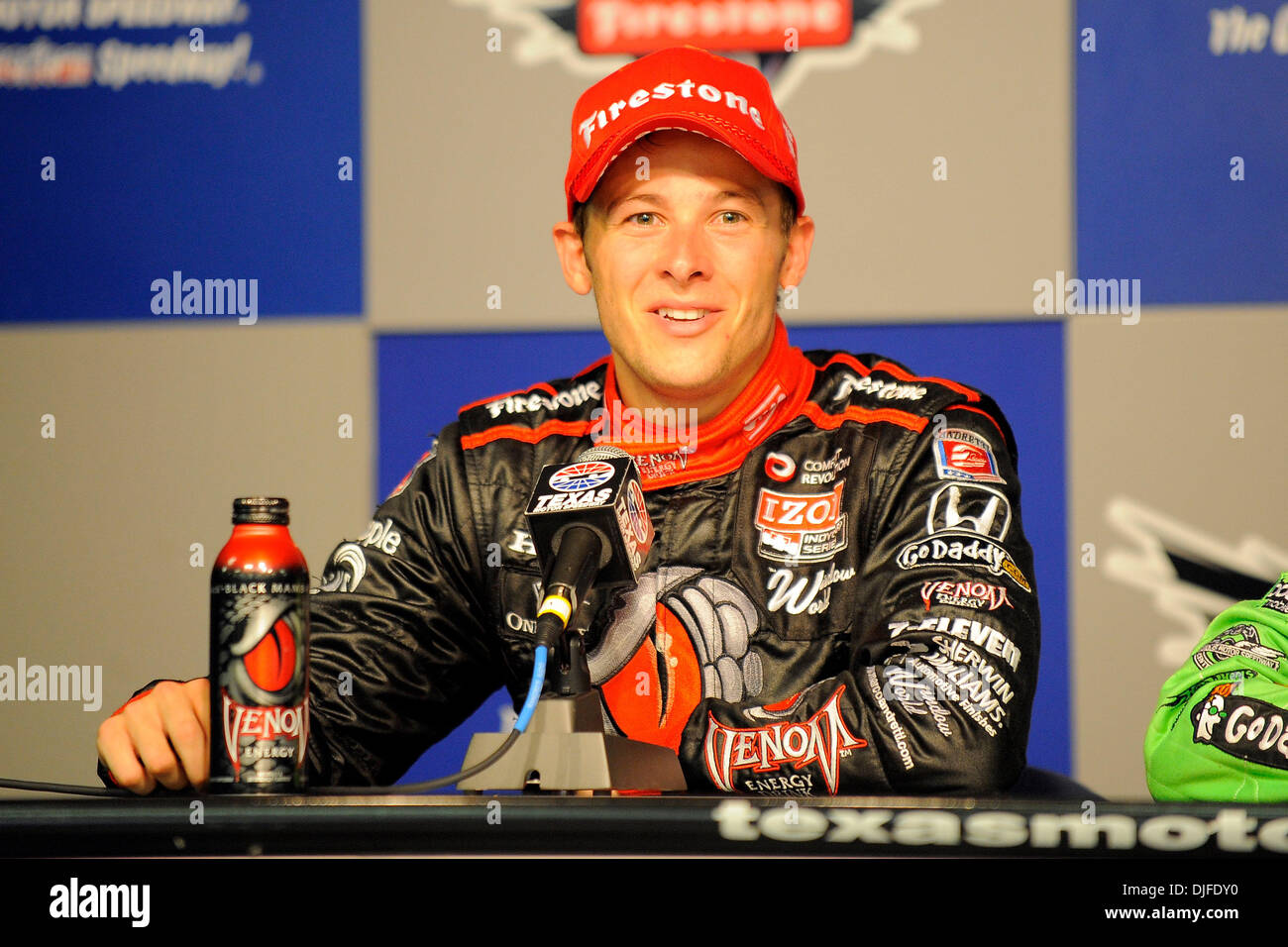 Marco Andretti (26) answers questions after finishing third at the ...