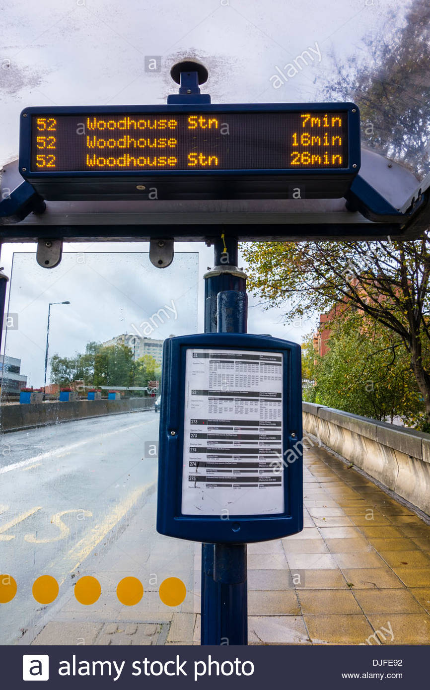 Bus Stop With Timetable And Bus Arrival Electronic Display Near To