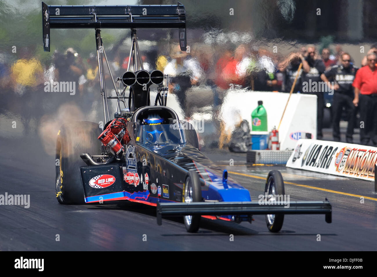 Pat Dakin in his Commercial Metal Fabrications Top Fuel dragster is ...