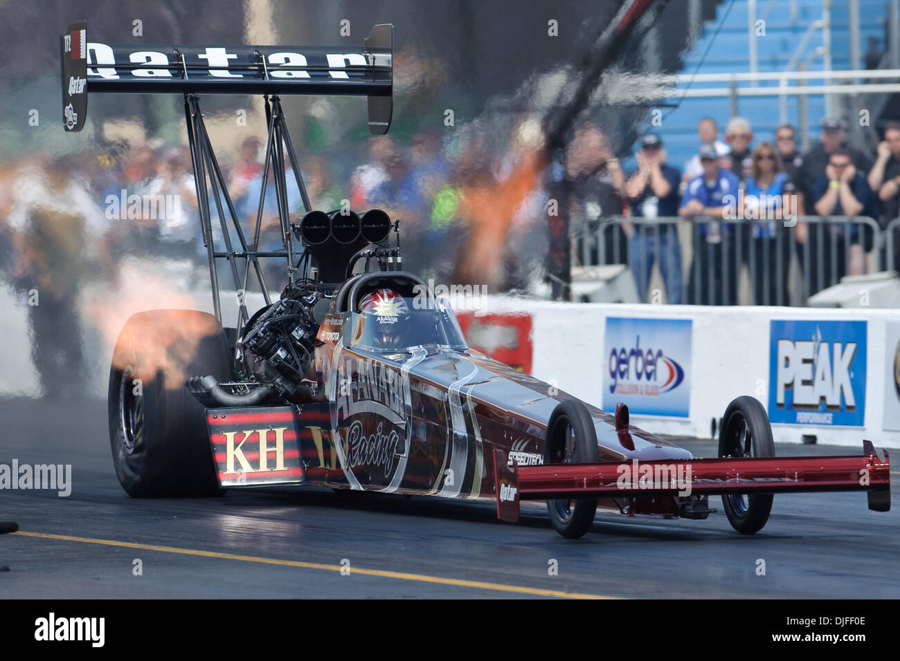 Larry Dixon heads down the track in his Al-Anabi Racing Top Fuel ...