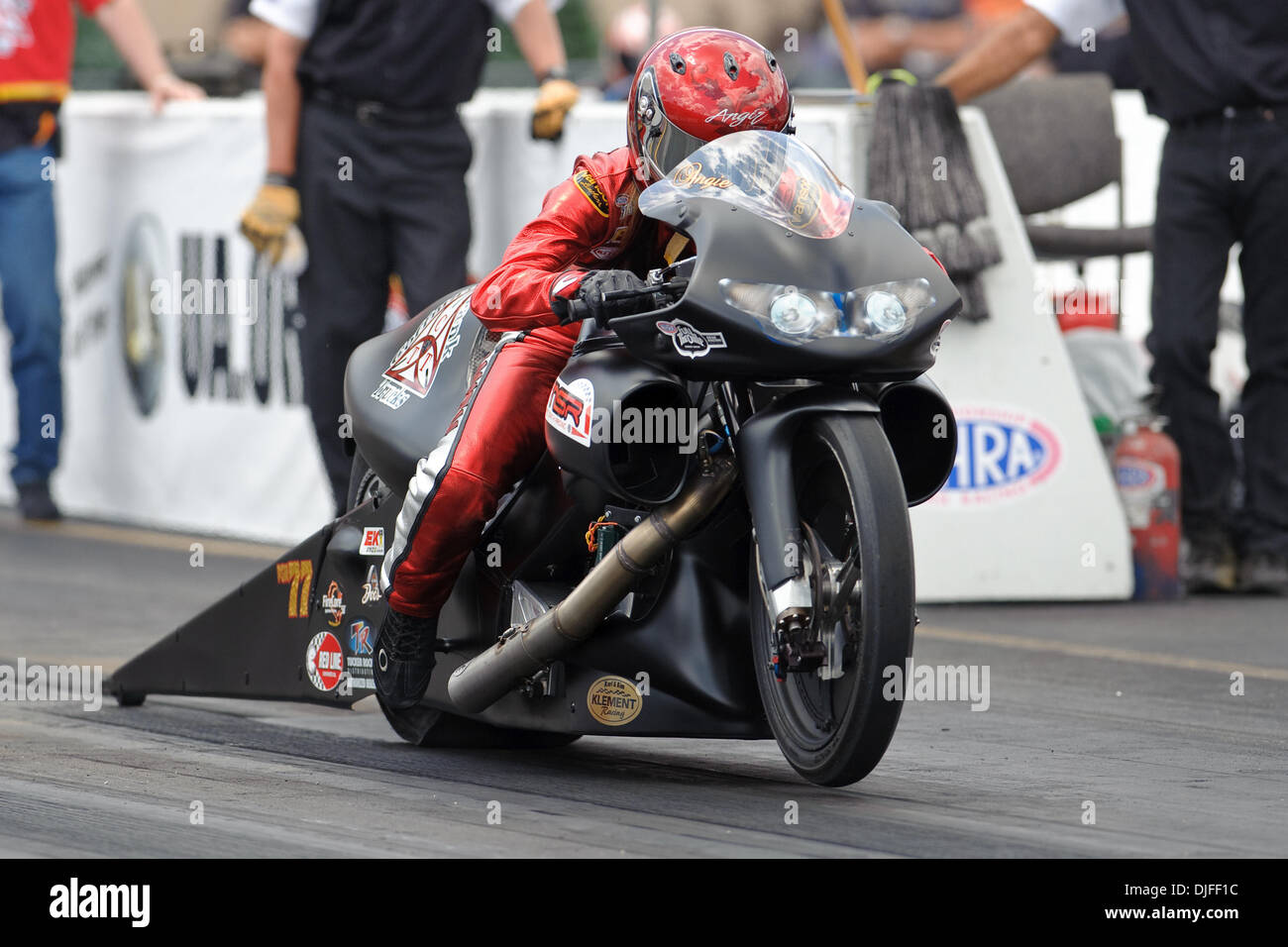 Angie Smith heads off the line on her Coffman Tank Trucks Buell during ...