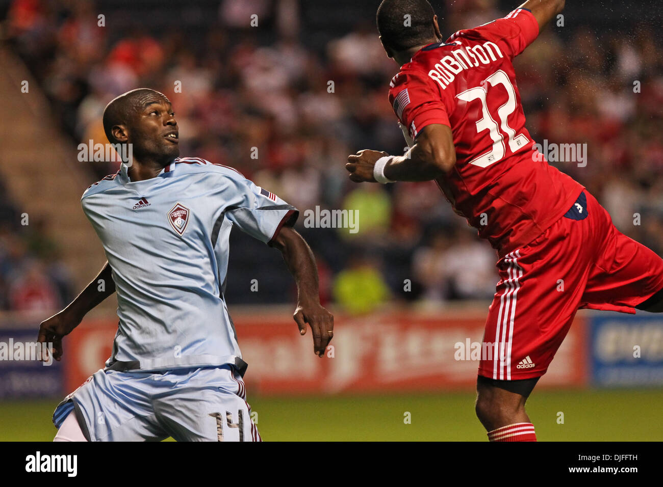 Dasan Robinson (#32) of the Fire defends Omar Cummings (#14) of the ...