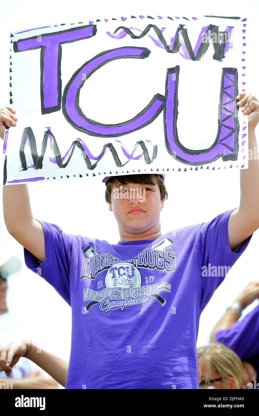 A TCU fan cheers on the Frogs during Game 2 of the NCAA CWS Super ...