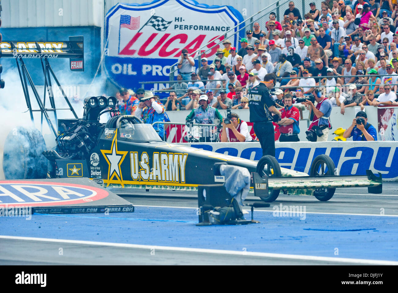 Tony Schumacher in the U.S. Army dragster, during the elimination ...