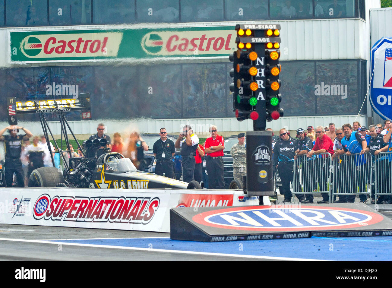 Tony Schumacher in the U.S. Army dragster, during the elimination ...