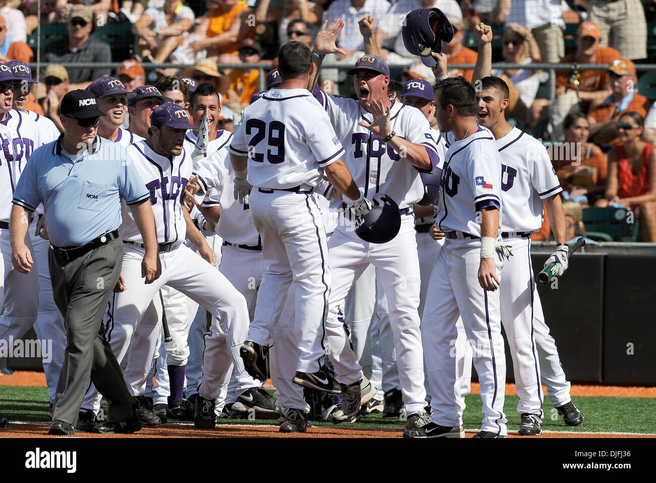 The TCU Horned Frogs celebrate (29) Aaron Schultz' home run in the ...