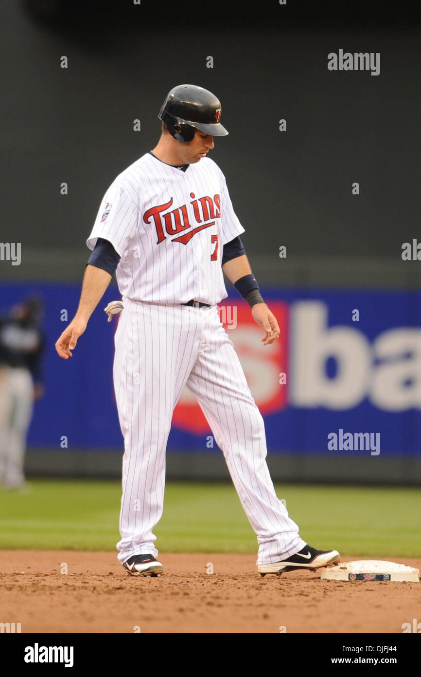 Minnesota Twins catcher Joe Mauer #7 reaches 2nd base on a fielders ...