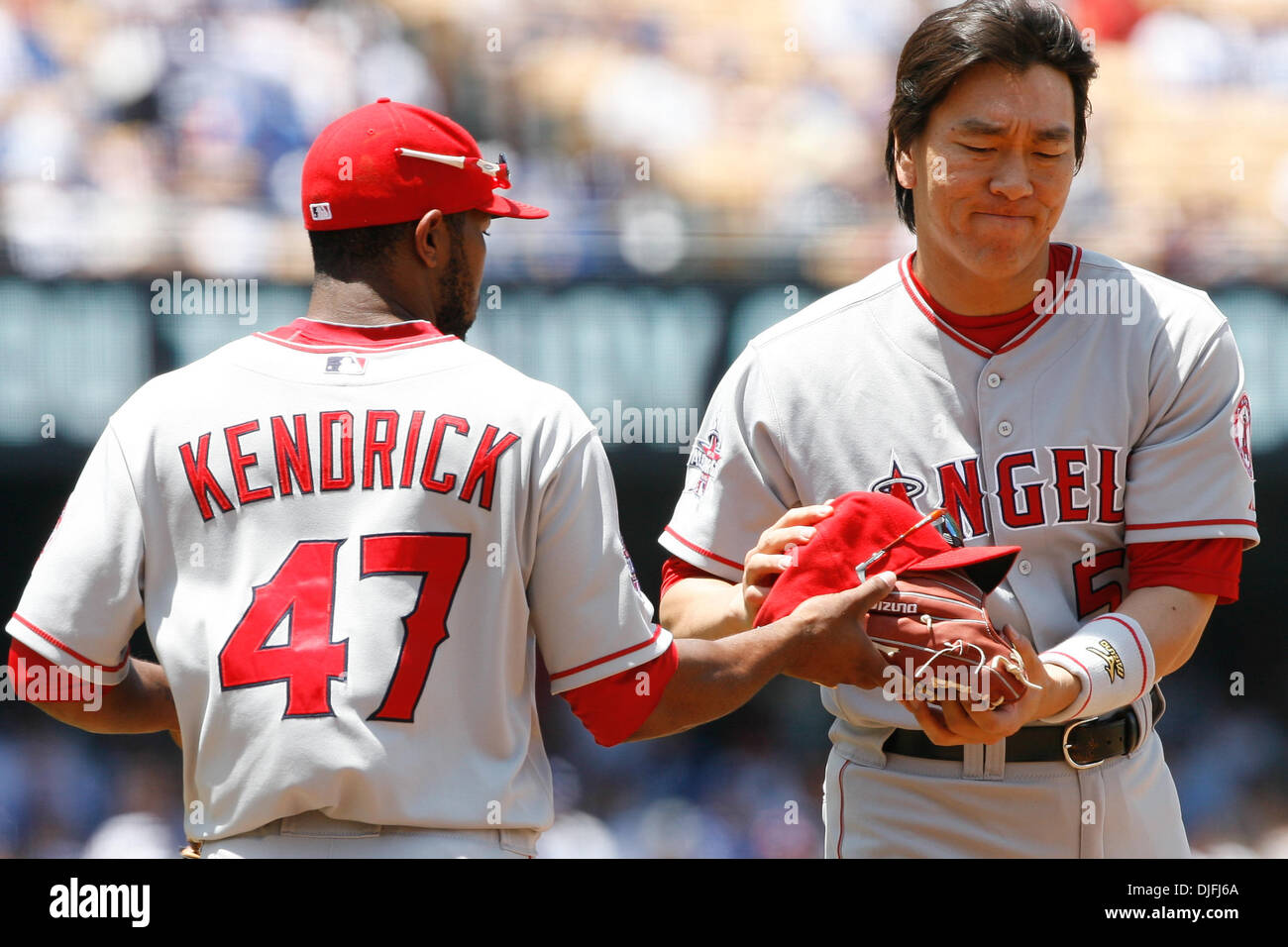 13 June 2010: Angels 2B #47 Howard Kendrick (L) brings Angels LF #55 ...