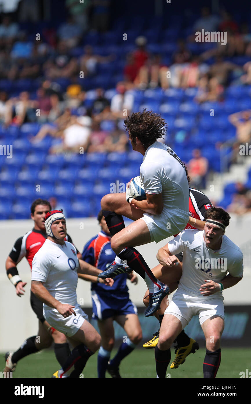 England Saxons Flanker Tom Wood (#6) leaps for the ball. England Saxon ...