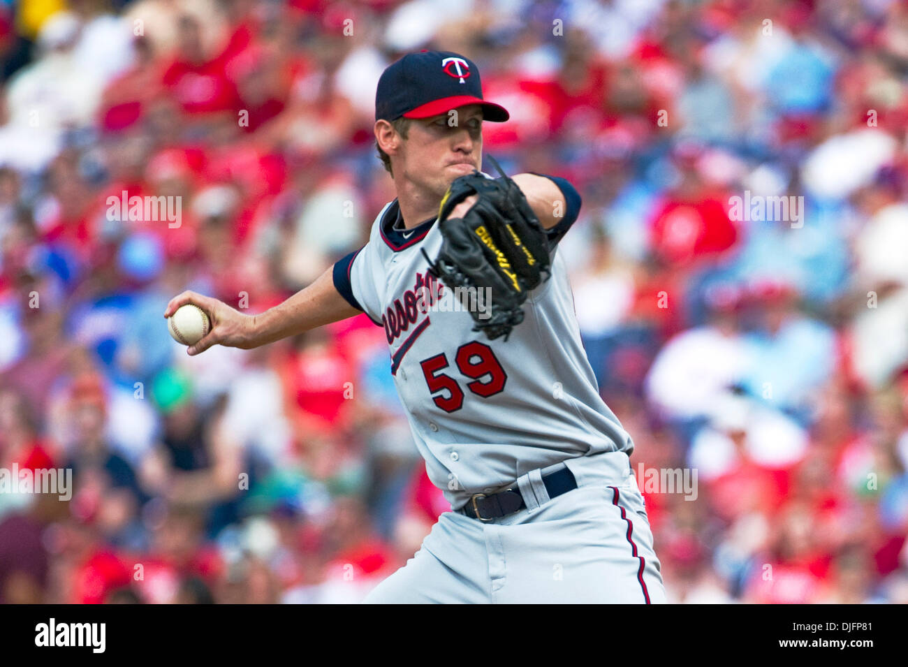 Twins starting pitcher Kevin Slowey #59 delivers a pitch, during the ...