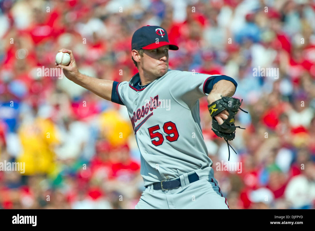 Twins starting pitcher Kevin Slowey #59 delivers a pitch in the game ...