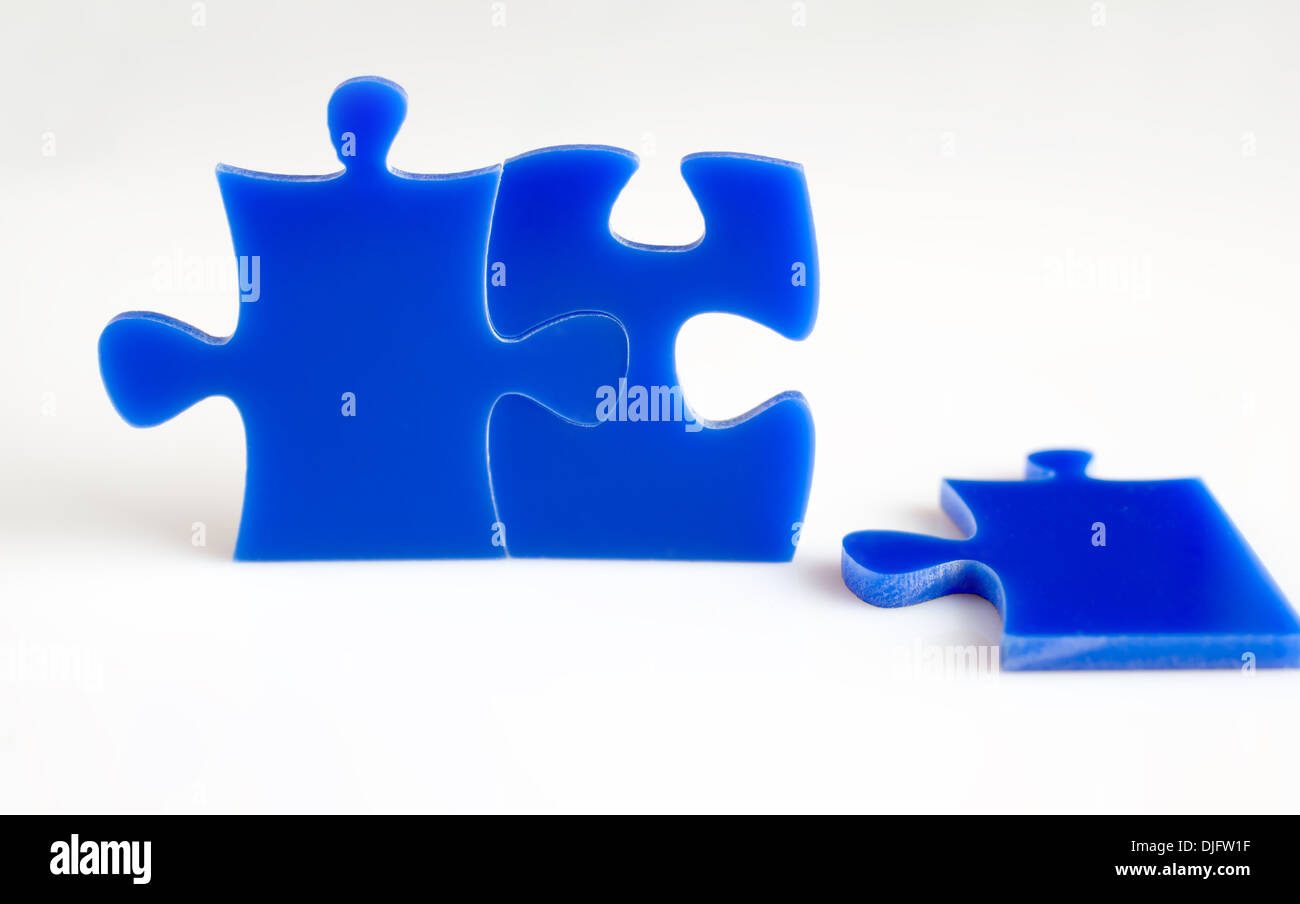 Blue Jigsaw puzzles blocks isolated on a white background Stock Photo ...
