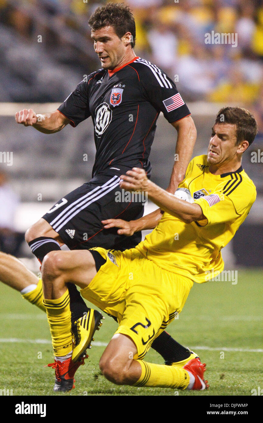 United midfielder Chris Pontius (13) and Crew defender Eric Brunner (23 ...