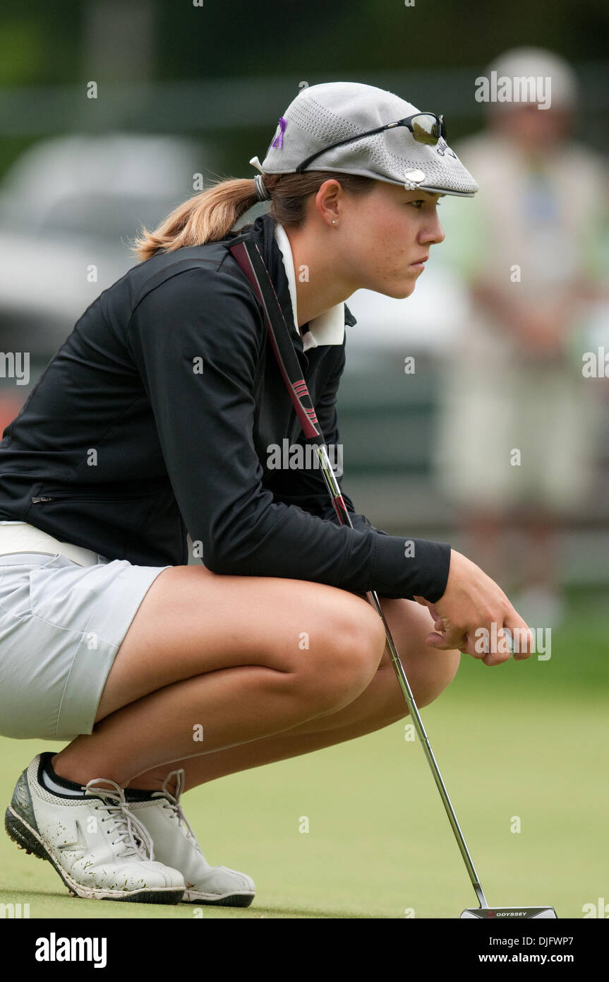 Golfer Vicky Hurst surveys her putt on the 9th hole during the third ...