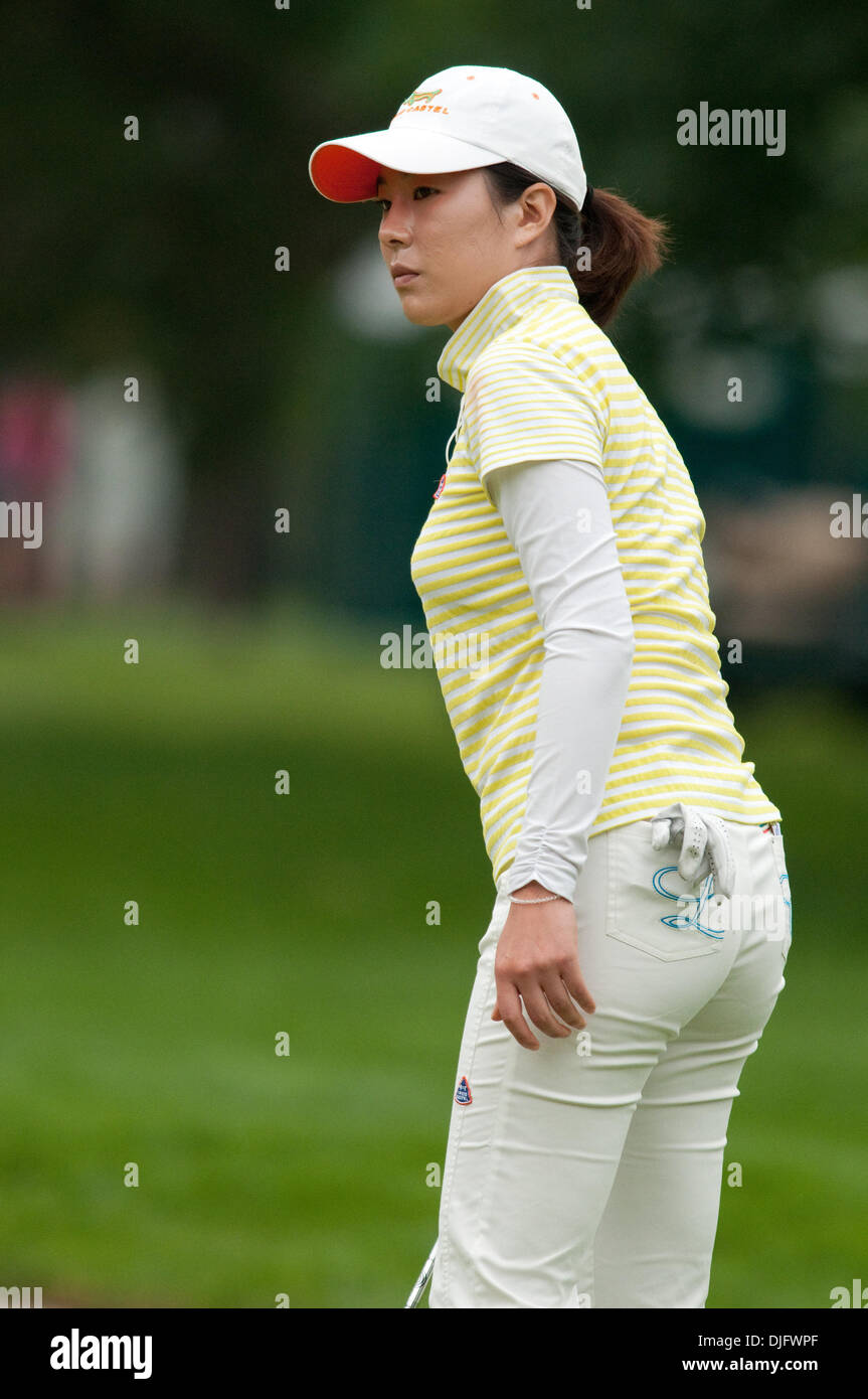 Golfer Shi Hyun Ahn surveys her putt at the 8th green during the third ...