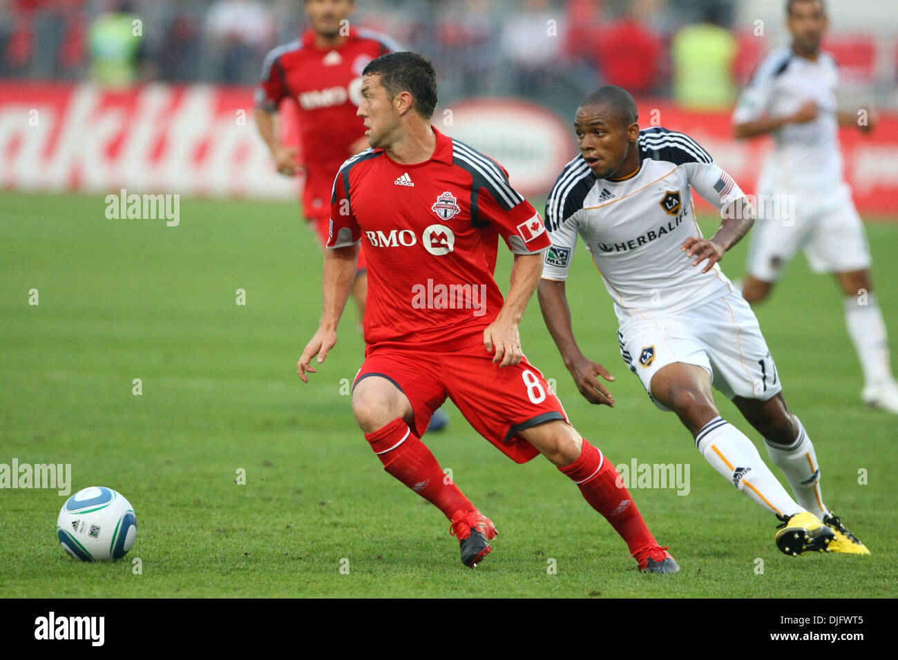 Toronto FC defensman Dan Gargan and Los Angeles Galaxy forward Tristan ...