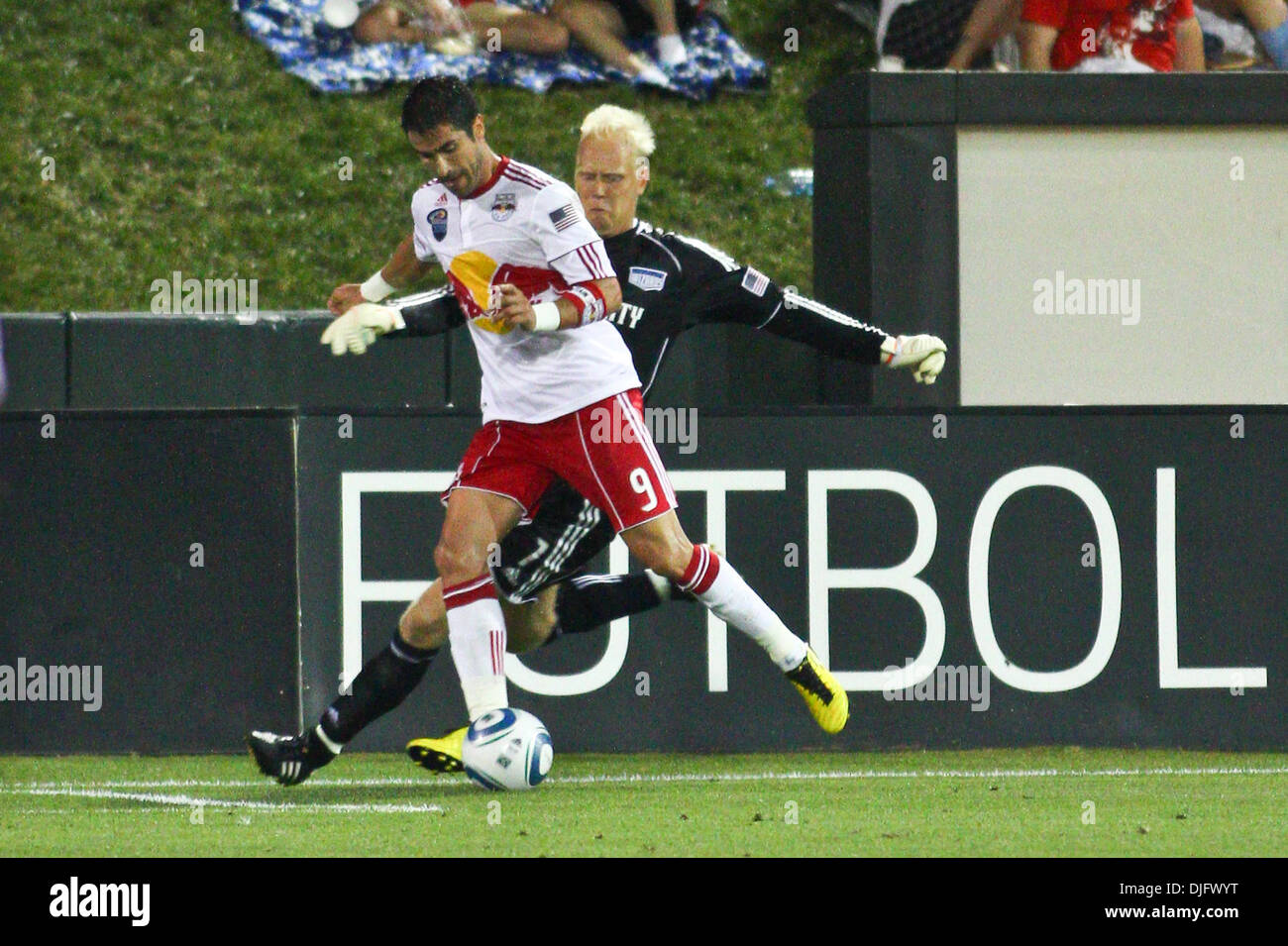 26 June 2010: Wizards goalkeeper Jimmy Nielsen tries stopping the shot ...