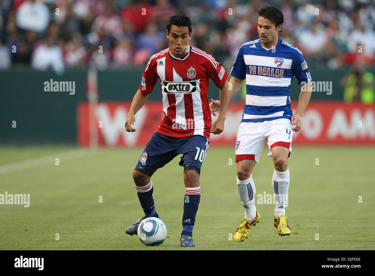 26 June 2010: FC Dallas D #4 Heath Pearce (L) and Chivas USA M #10 ...