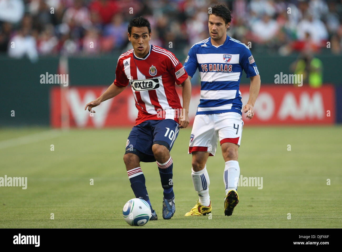 26 June 2010: FC Dallas D #4 Heath Pearce (L) and Chivas USA M #10 ...