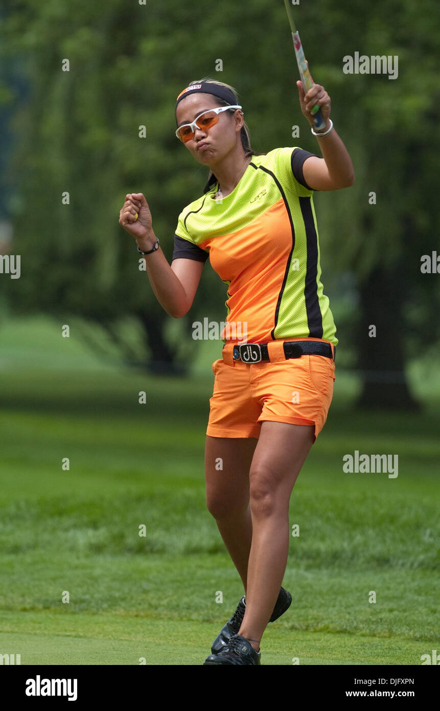 Golfer Jennifer Rosales reacts to sinking a birdie putt at the 3rd hole ...