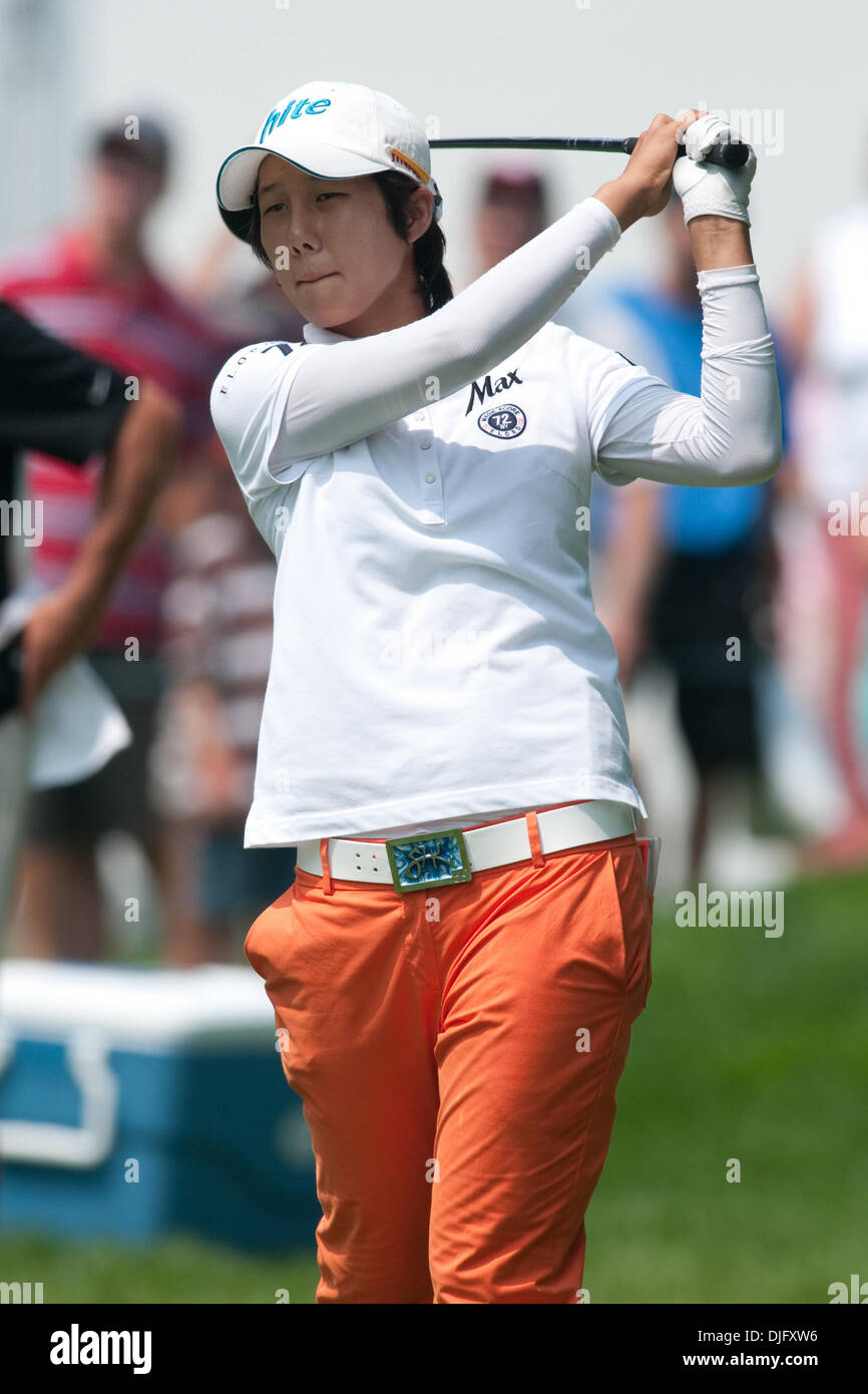 Golfer Song-Hee Kim watches her tee shot at the 11th tee during the ...
