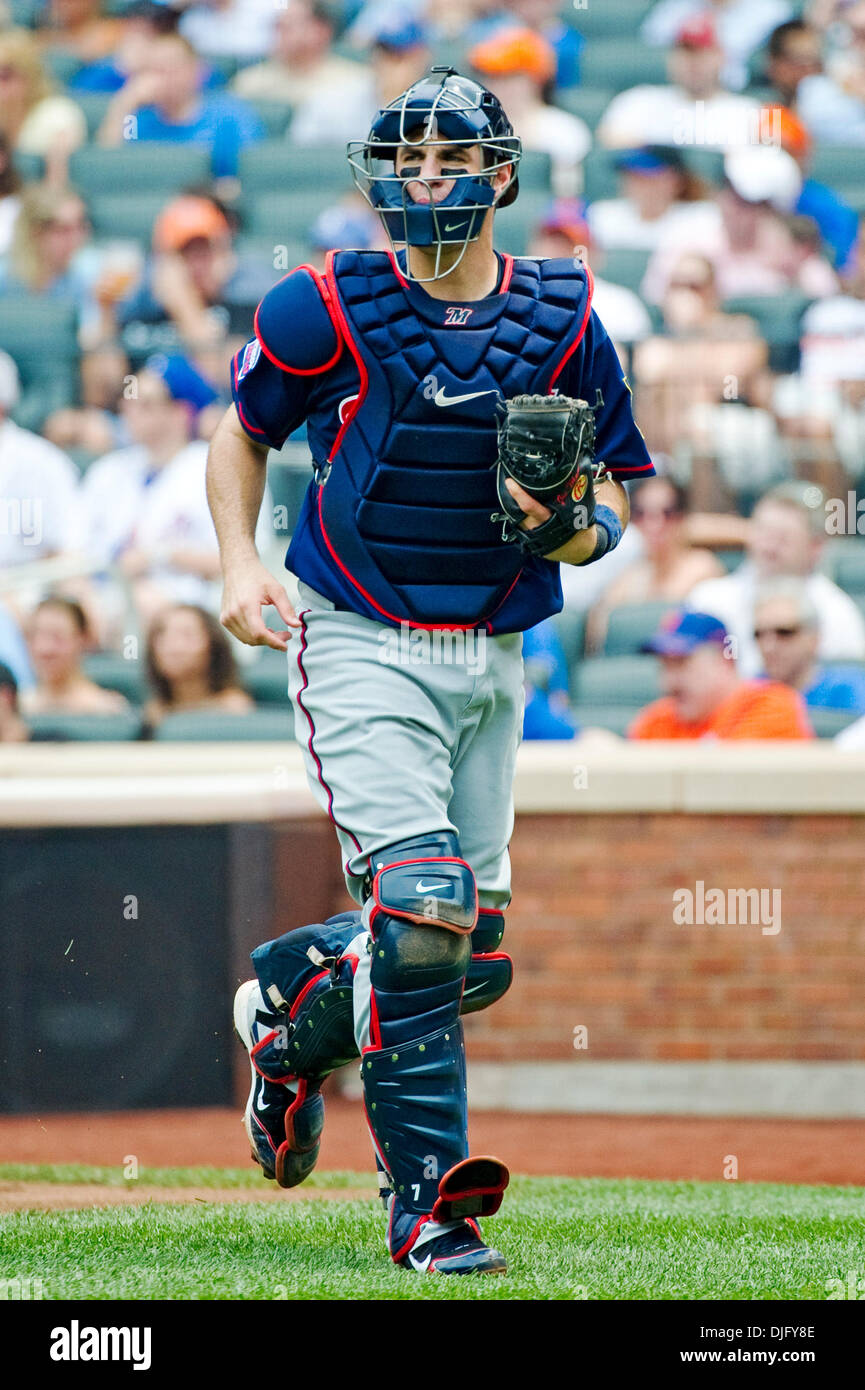 Twins catcher Joe Mauer #7 heads off the field at the end of the third ...