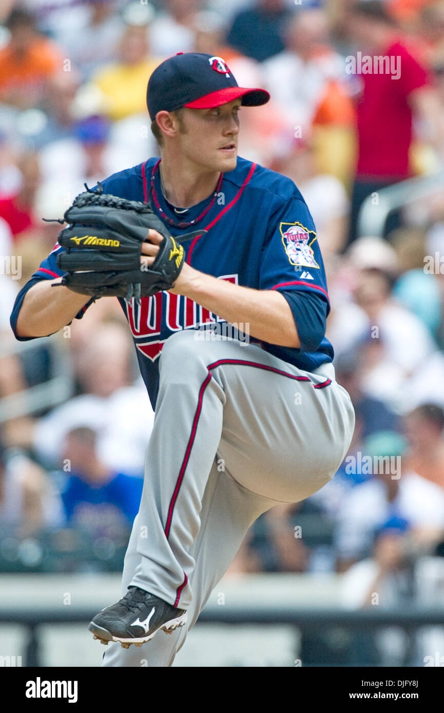 Twins starting pitcher Scott Baker #30 delivers a pitch, during the ...