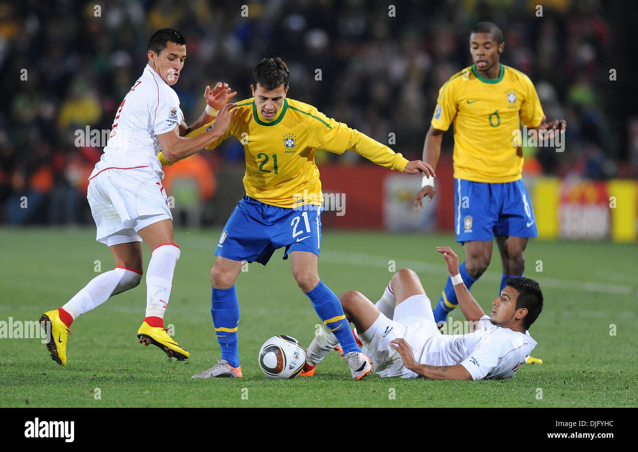 June 28, 2010 - Johannesburg, South Africa - Nilmar of Brazil fights ...
