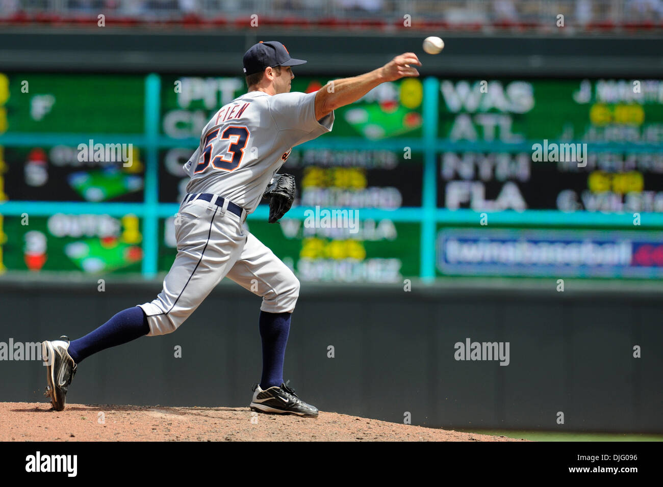 Detroit Tigers relief pitcher Casey Fien #53 throws to first holding ...