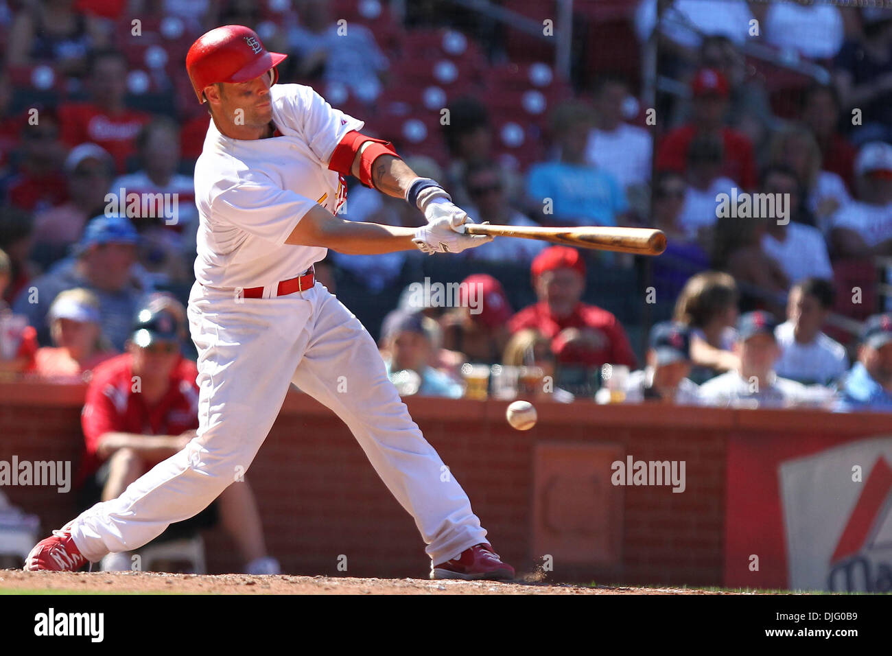 St. Louis Cardinals catcher Jason LaRue (21) hits a pitch foul during ...