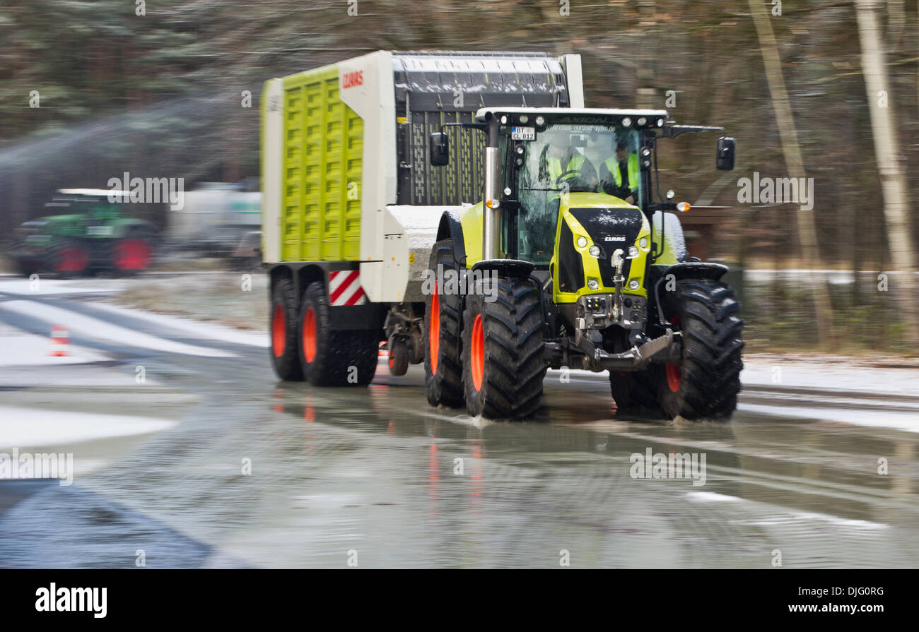 A farmer drives his tractor during a safe driving training for farmers ...