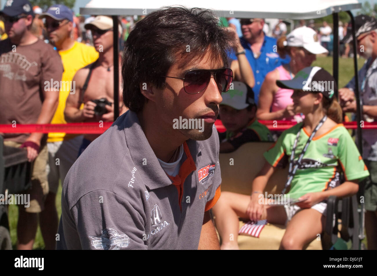 Brazilian driver Mario Romancini arrives for a fan autograph session at ...