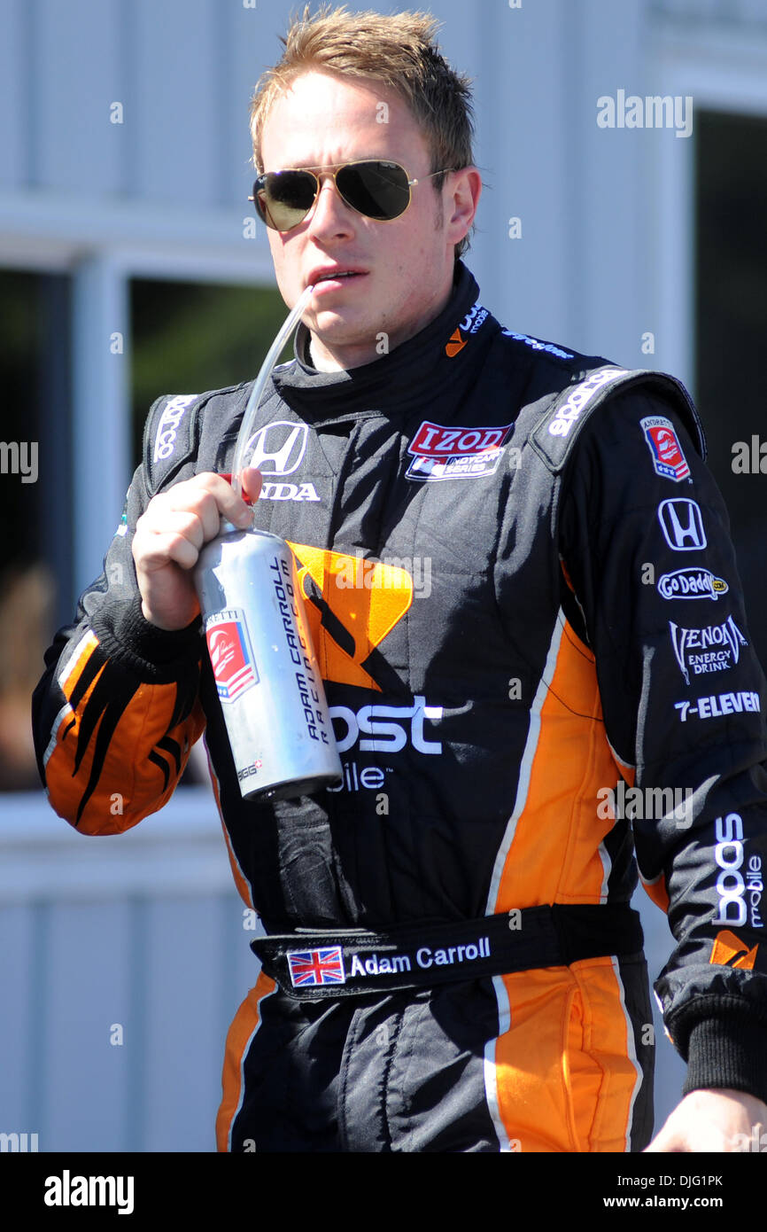 Rookie Adam Carroll takes a drink after practicing the Boost Mobile ...
