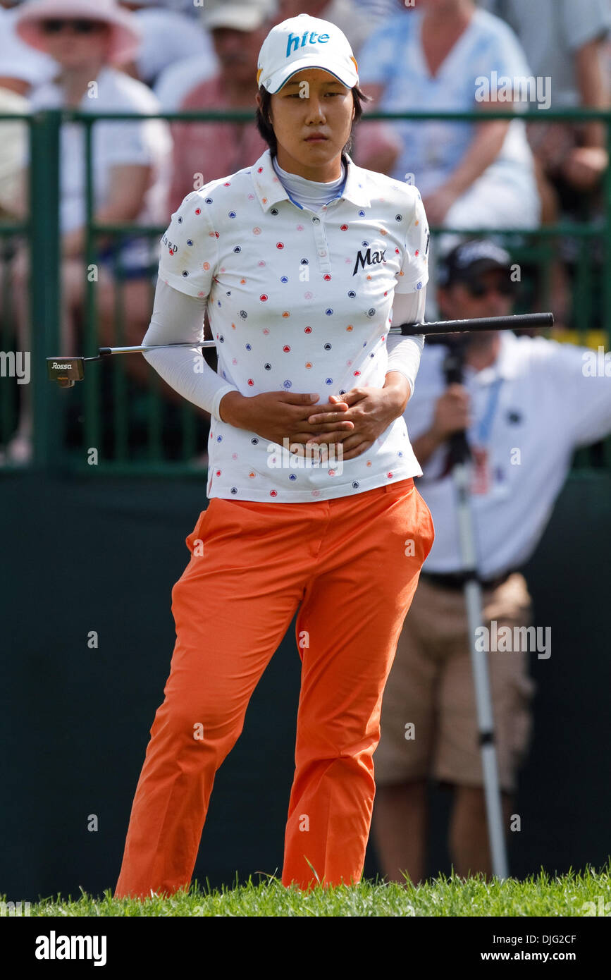Song-Hee Kim, of South Korea, waits to putt on the 18th green during ...