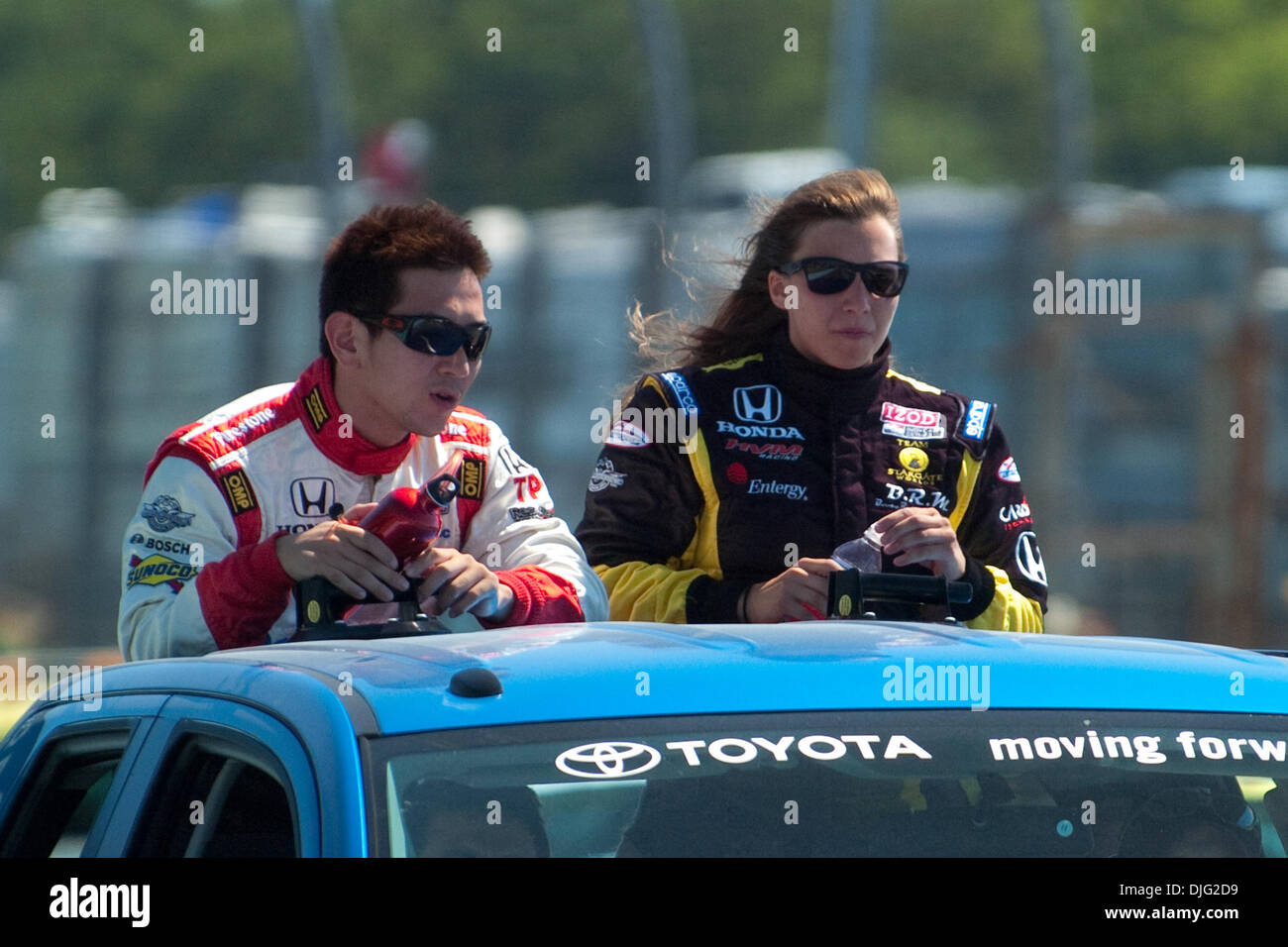 Drivers Hideki Mutoh (left) and Simona De Silvestro (right)prior to the ...