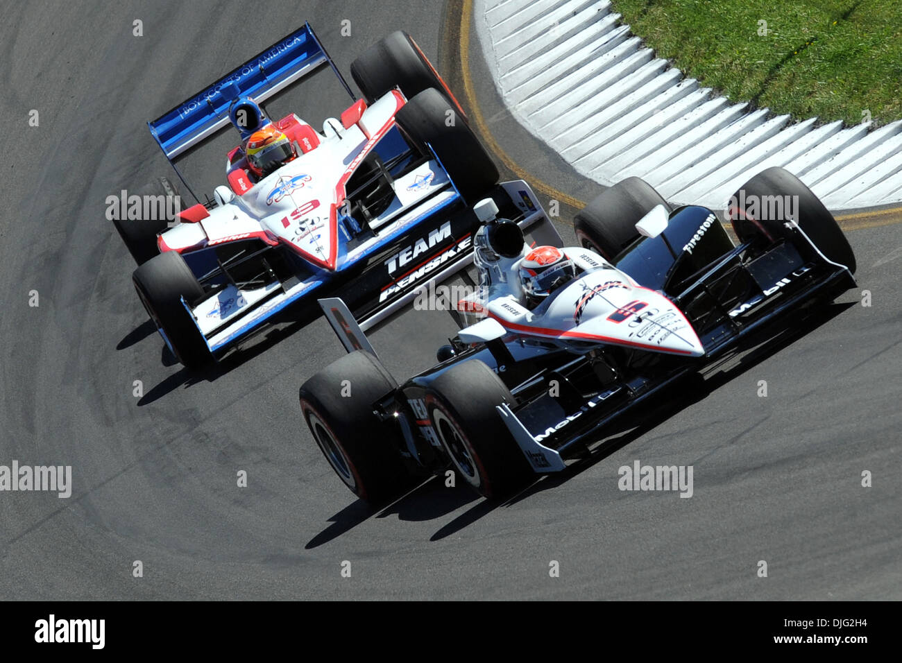 Team Penske's Ryan Briscoe (6) leads Dale Coyne Racing's Alex Lloyd ...
