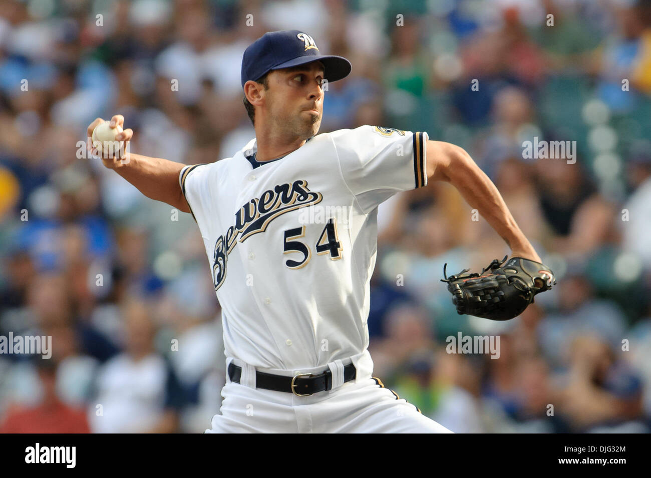 Milwaukee Brewers relief pitcher David Riske (54) throws to the plate ...