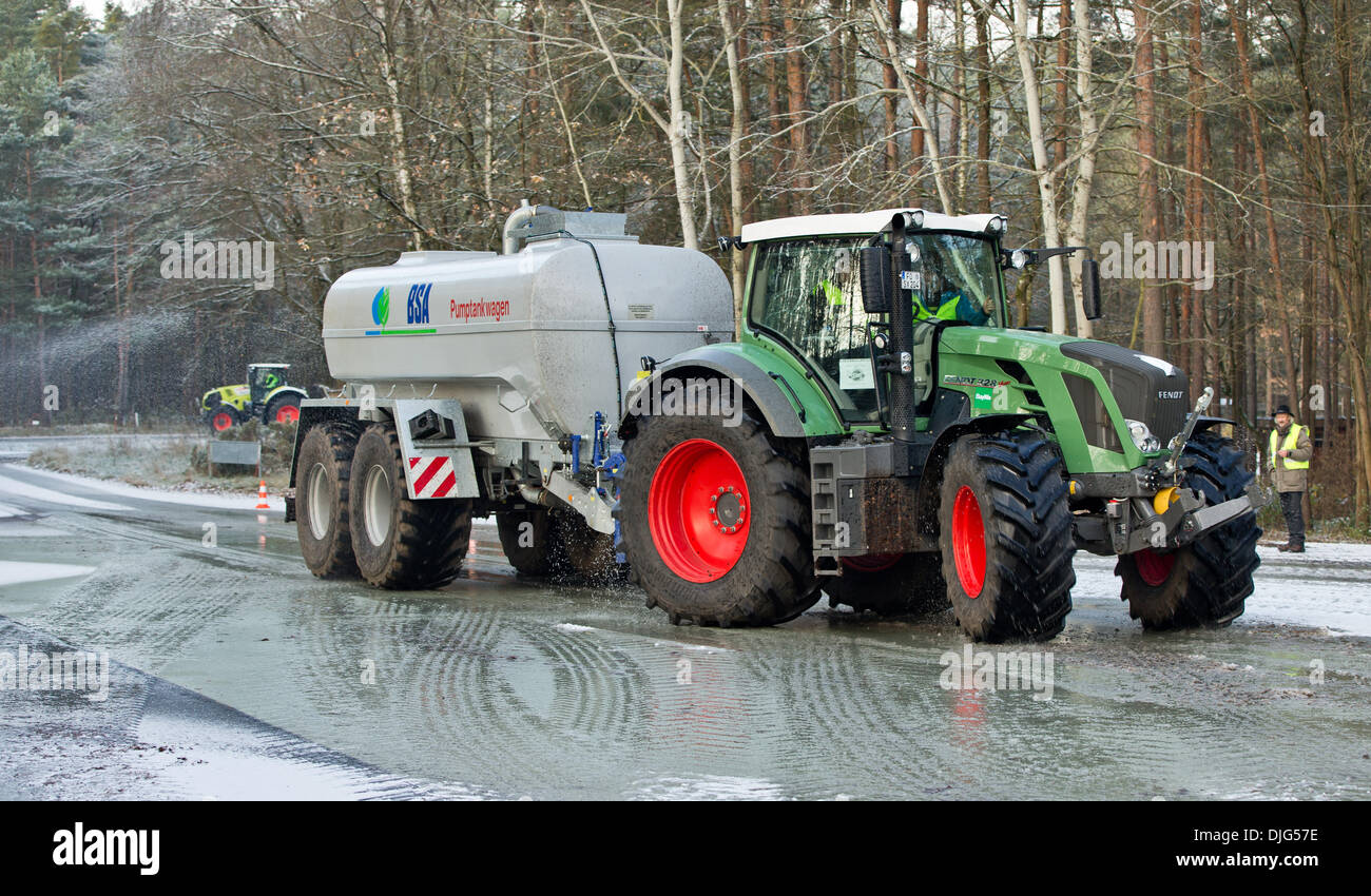 A farmer drives his tractor during a safe driving training for farmers ...